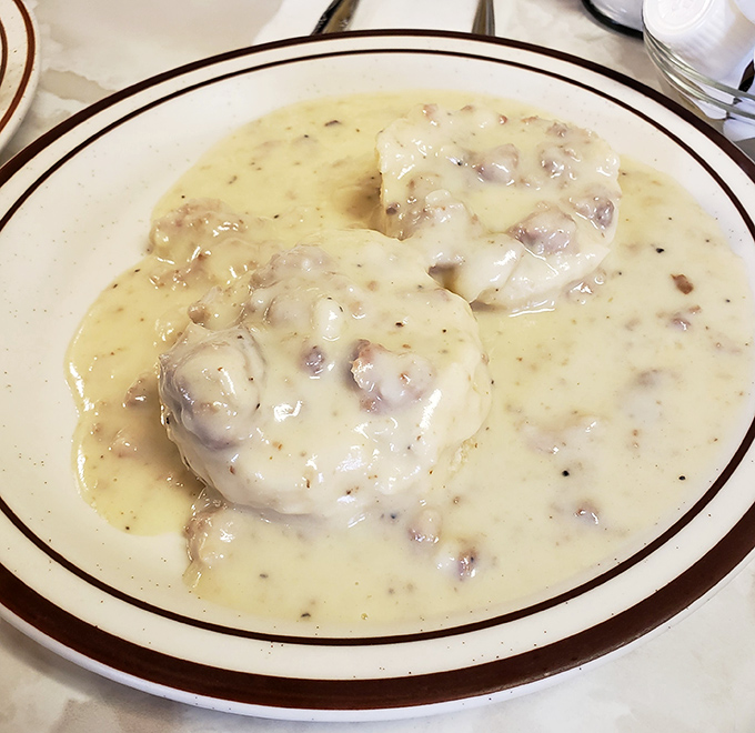 Biscuits swimming in peppered gravy, the kind of comfort that makes rainy Oregon mornings bearable.