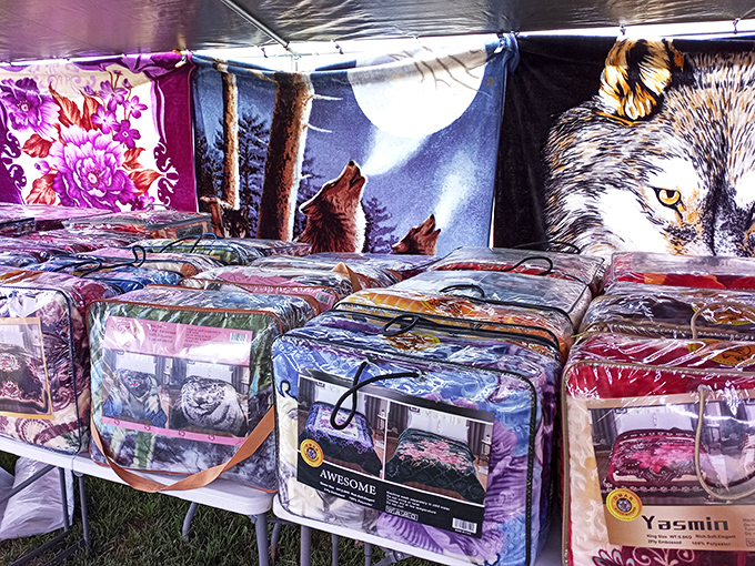 Wolf blankets howl for attention among floral bedspreads. In Michigan winters, these aren't just decorative&mdash;they're survival gear with personality.