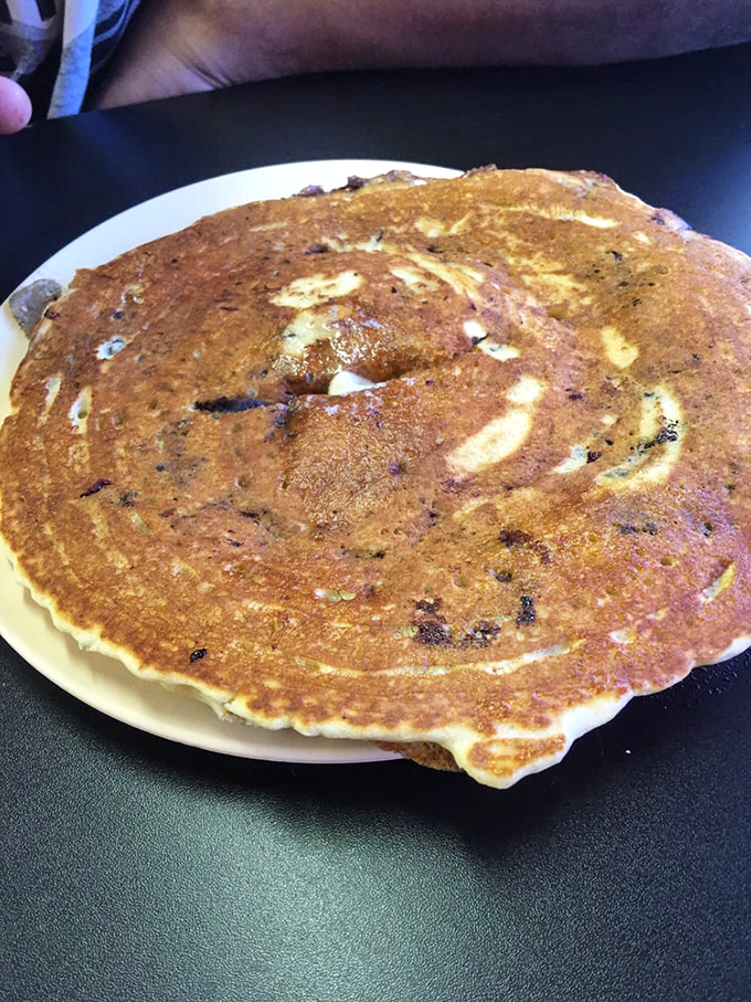 Behold the blueberry pancake that launched a thousand return trips &ndash; golden perfection studded with purple jewels of happiness.