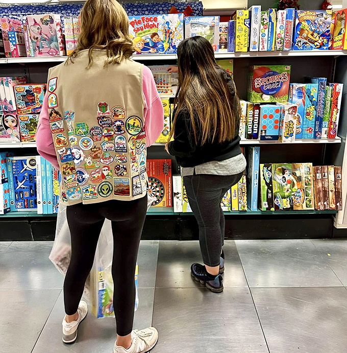 Board game heaven where family game nights are born. That NBA-themed set probably contains more nostalgia than your childhood bedroom.