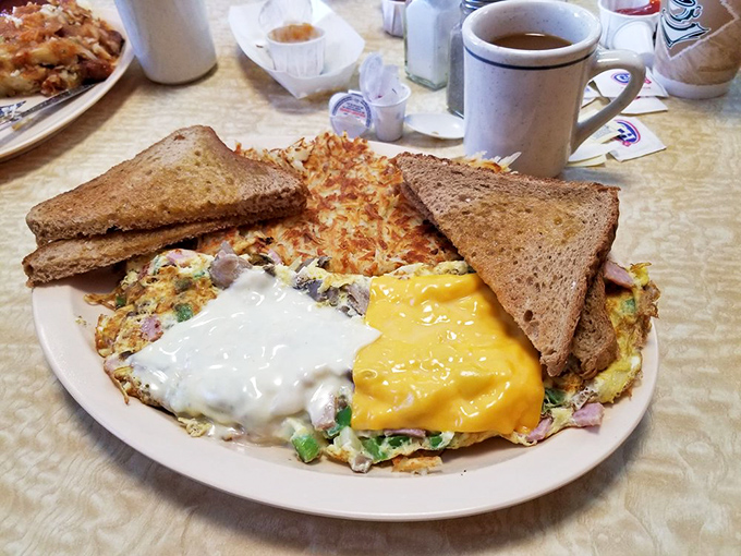 Breakfast doesn't get more honest than this&mdash;golden hash browns, perfectly cooked eggs, and toast standing by for yolk-sopping duty. Coffee mandatory.