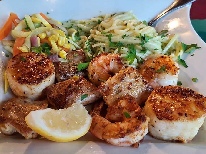 The seafood platter arrives like a greatest hits album of the ocean&mdash;scallops, shrimp, and fish sharing the spotlight in perfect harmony. 