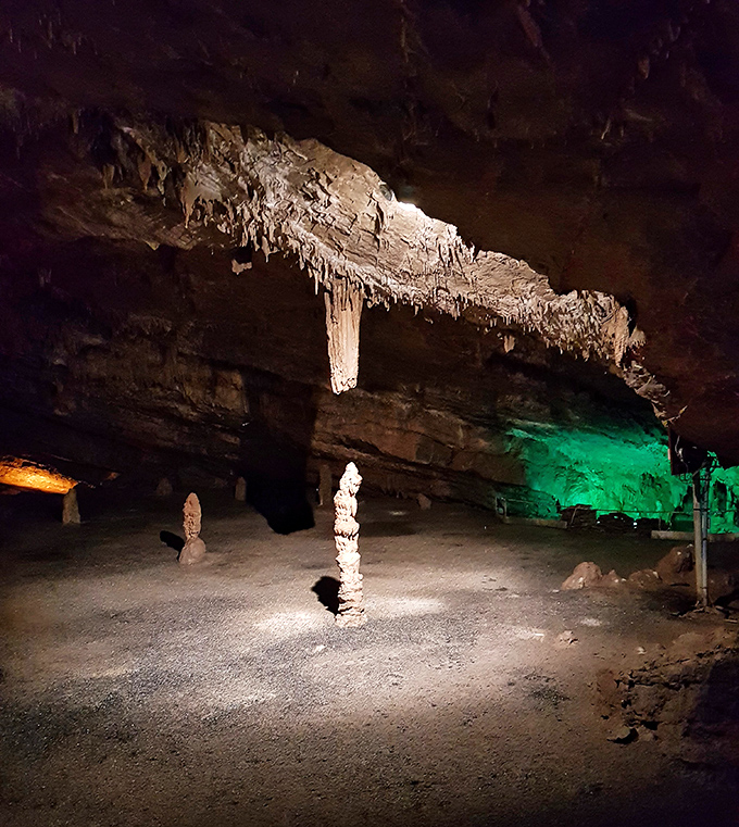 Colorful illumination brings out the cave's natural beauty, proving that even rocks can benefit from good lighting.