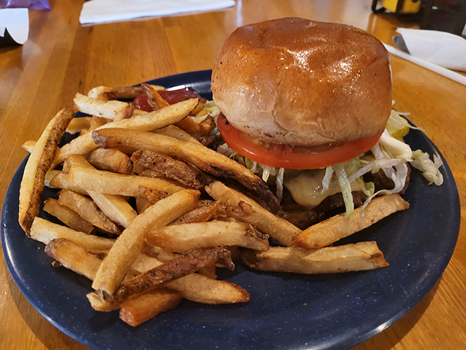 Classic American comfort: juicy burger, crispy fries, and the kind of satisfaction money can't buy.