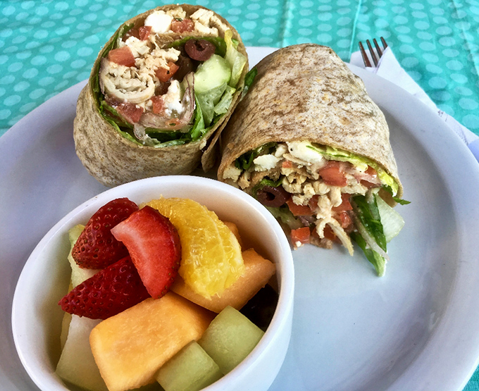 This isn't just a wrap &ndash; it's a morning fiesta bundled in a tortilla, with fresh fruit playing the perfect supporting role.