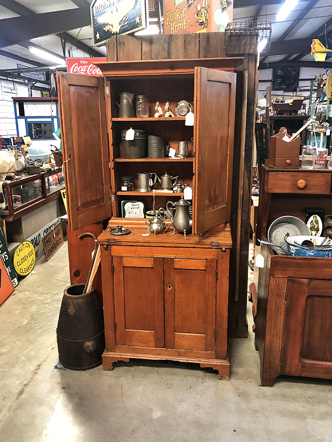This isn't just a cabinet; it's a wooden time capsule where someone's great-grandmother once stored her prized silver and family secrets.