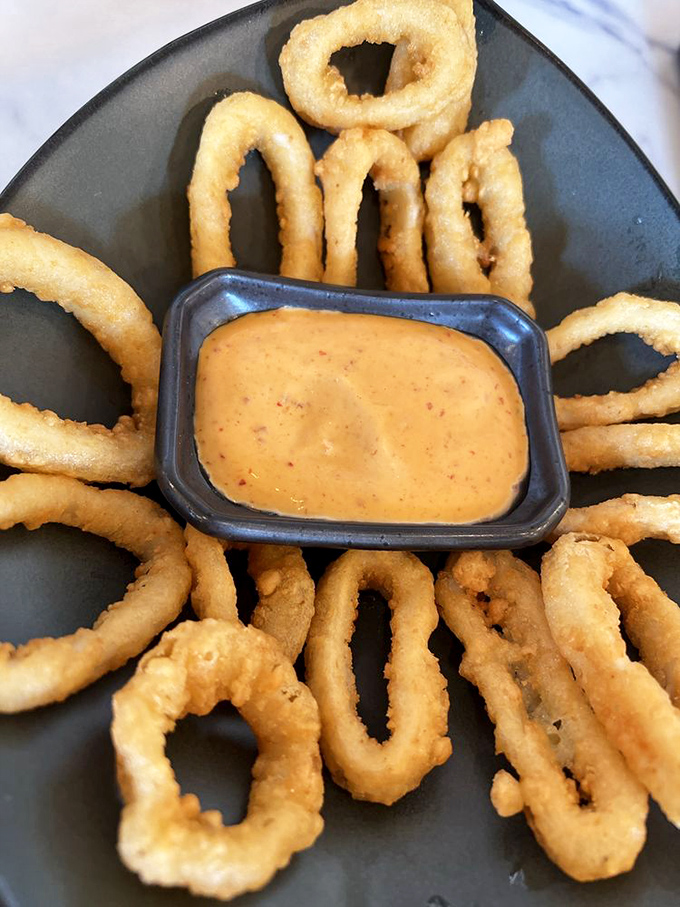 Calamari rings that could double as delicious life preservers &ndash; if you weren't too busy eating them.