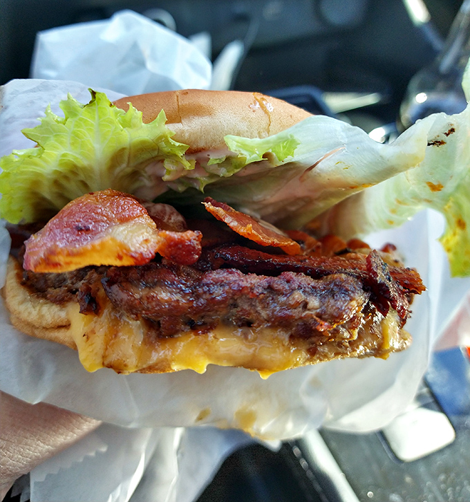 This bacon cheeseburger doesn't need Instagram filters – it's already achieved peak deliciousness with honest ingredients and zero pretense.