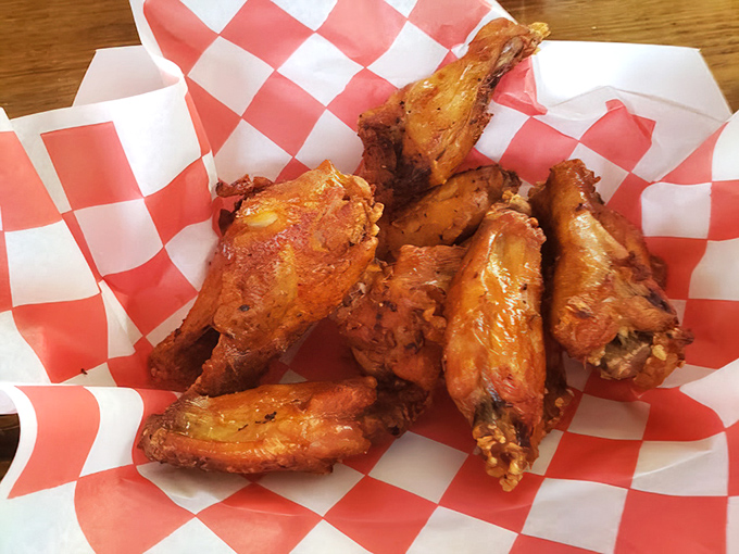 Wings that have clearly been introduced to heat in all the right ways&mdash;crispy, seasoned, and ready to make your fingers gloriously messy.