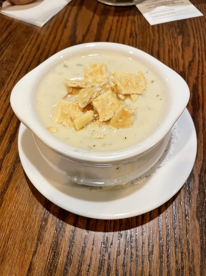 New England clam chowder topped with oyster crackers&mdash;the kind that makes you wonder if they've secretly installed a pipeline directly from Cape Cod.