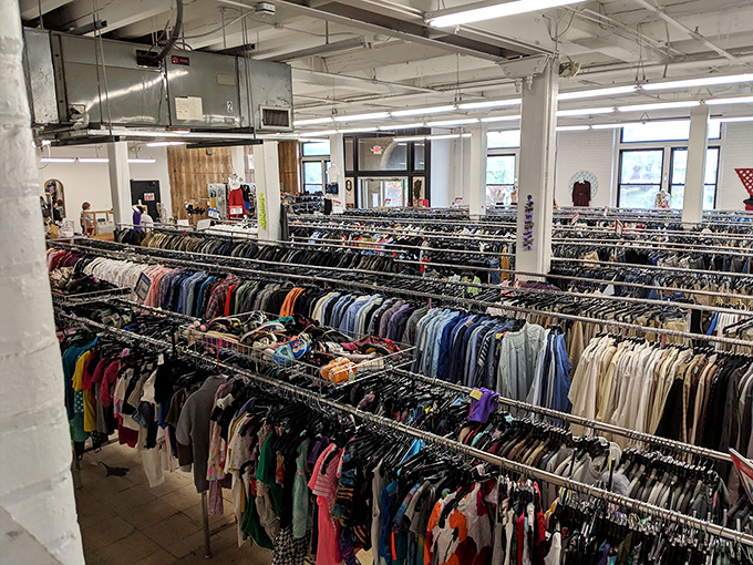 The clothing section stretches toward infinity like a rainbow of fabric possibilities. Somewhere in these racks is the perfect jacket you didn't know you needed.