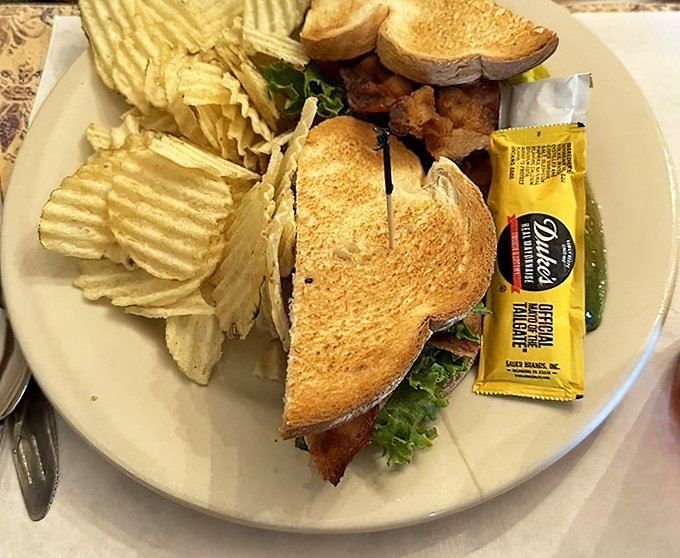 A sandwich that understands proper architecture. Layers of goodness between perfectly toasted bread&mdash;the structural integrity alone deserves an engineering award. 