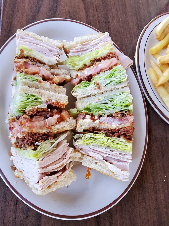 This towering club sandwich proves that sometimes bigger really is better, especially at lunchtime.