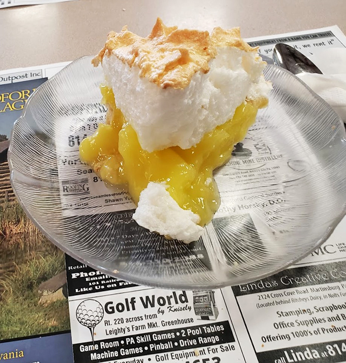 Lemon meringue pie that would make your grandmother both proud and jealous. That cloud of meringue isn't just dessert &ndash; it's edible optimism.