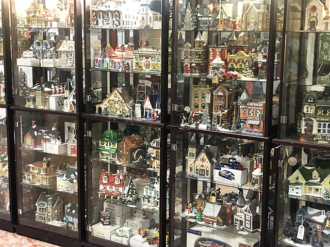 Tiny architectural wonders create an entire village behind glass. Each miniature building holds stories bigger than its footprint.