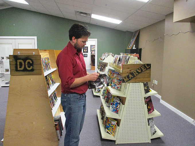 Comic book collectors speak their own language in this corner of nerd paradise. Marvel and DC peacefully coexist on shelves where childhood memories come with price tags.