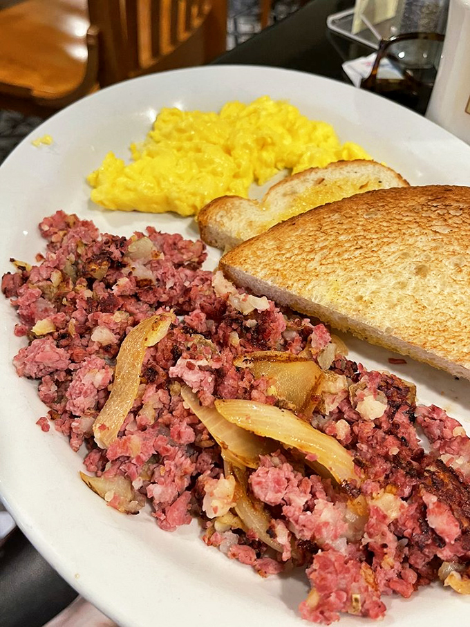 Corned beef hash that would make your grandmother jealous, with perfectly crispy edges and savory bits that pair beautifully with those sunny scrambled eggs.