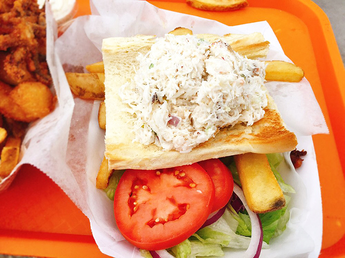 This crab sandwich is piled so high, it needs a building permit and possibly a ladder.
