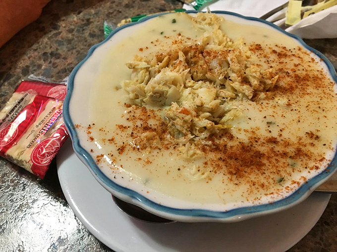 Cream of crab soup so rich and velvety it should come with its own warning label: "May induce involuntary sighs of contentment."