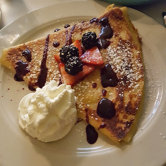 A perfect crepe: paper-thin yet somehow substantial enough to cradle fresh berries and whipped cream. Breakfast or dessert? Yes, please.