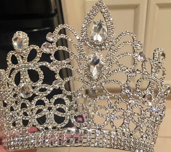 Royalty for a day! This crystal crown doesn't require blue blood – just the confidence to wear it like you were born to rule.