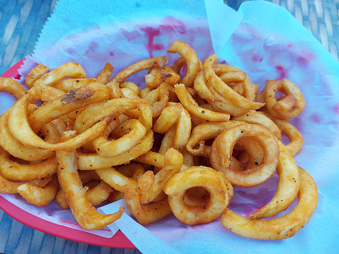 These curly fries aren't just side dishes&mdash;they're golden, seasoned spirals of potato perfection that demand equal billing with any entr&eacute;e.