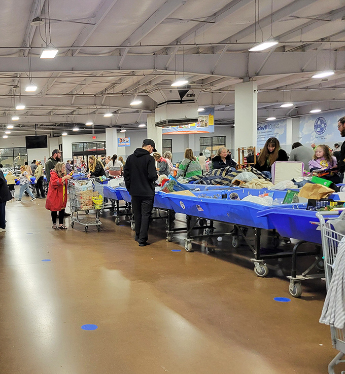 The "fresh bin rush" in action&mdash;shoppers strategically positioned like chess players, ready to make their moves when new merchandise arrives.