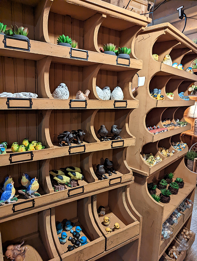 Whimsical bird figurines nest on custom shelving, a menagerie of collectibles that bring nature's charm indoors.
