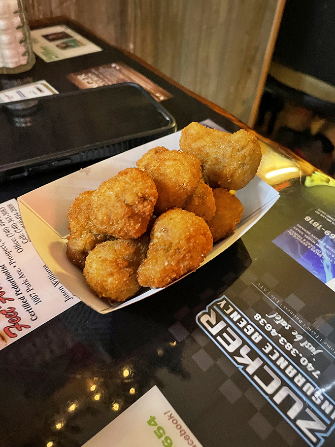 Golden-fried mushroom perfection that would make even vegetable skeptics reconsider their life choices. Crispy outside, juicy inside &ndash; nature's perfect design.
