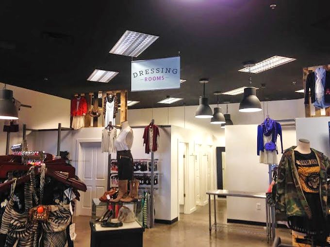 The dressing room area: where retail therapy happens without the sticker shock that usually requires actual therapy afterward.