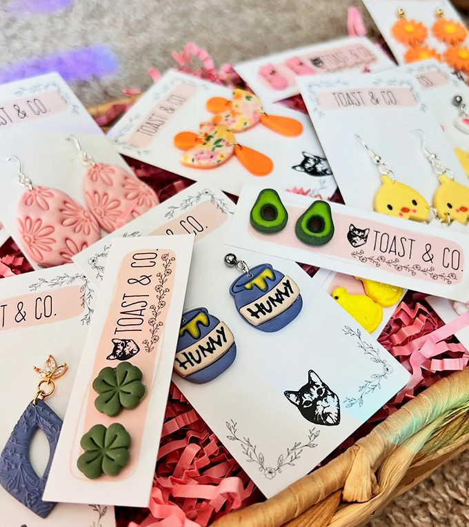 Earrings dangle like tiny works of art, each pair waiting to become someone's signature conversation starter.