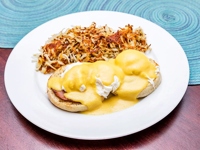 Eggs Benedict that would make the Pope himself convert to the Church of Hollandaise. That golden sauce is practically liquid sunshine.