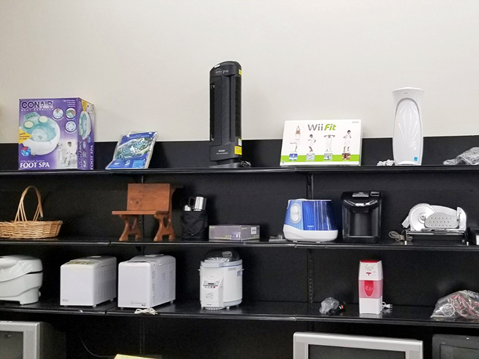 The electronics section: where abandoned foot spas and Wii Fit dreams find second chances. Someone's "I'll definitely use this" becomes your actual bargain.