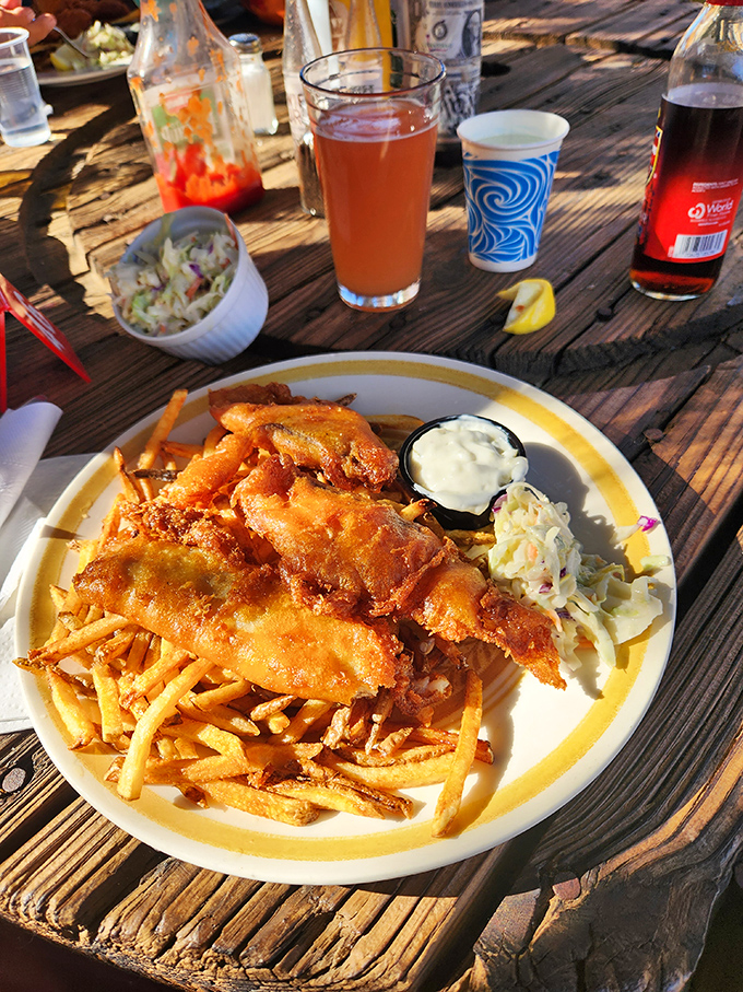 Fish and chips that would make coastal seafood shacks jealous, served with the kind of fries that demand to be savored one by one.