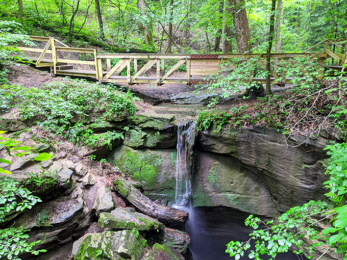 This charming footbridge seems to float above a perfect little waterfall &ndash; Mother Nature's version of a spa feature, minus the hefty day pass.