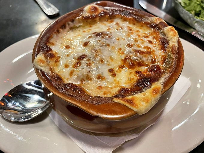 French onion soup that's worth the cheese pull embarrassment. That golden, bubbling top is the culinary equivalent of striking gold in Pennsylvania.