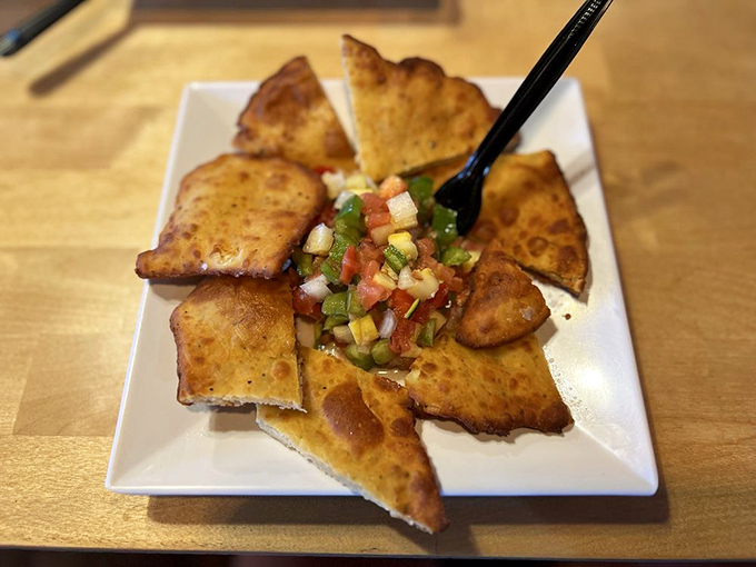 Whoever decided to arrange homemade fried bread around fresh salsa deserves a Nobel Prize for culinary genius &ndash; it's Florida innovation at its finest.