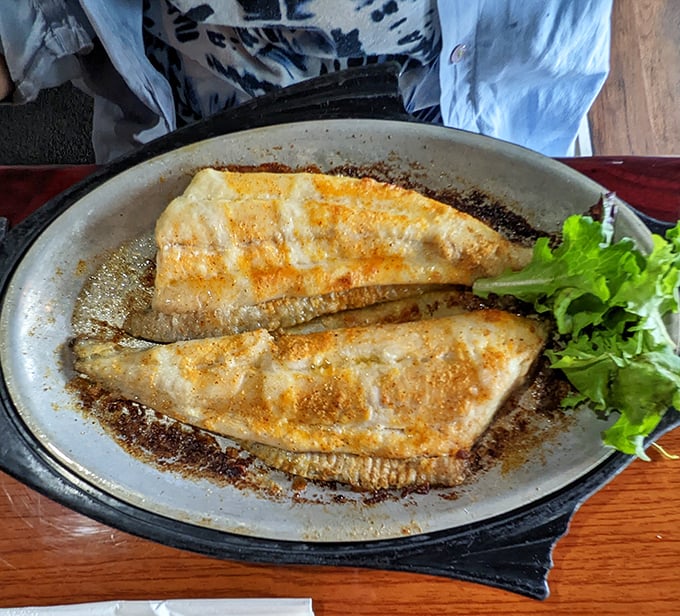 Flounder so perfectly seared it practically tells you its life story. That delicate browning is what seafood dreams are made of.