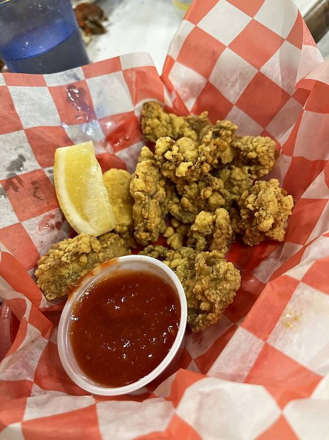 Fried oysters that crackle with each bite, served with cocktail sauce and lemon&mdash;proof that simplicity often delivers the most profound satisfaction.