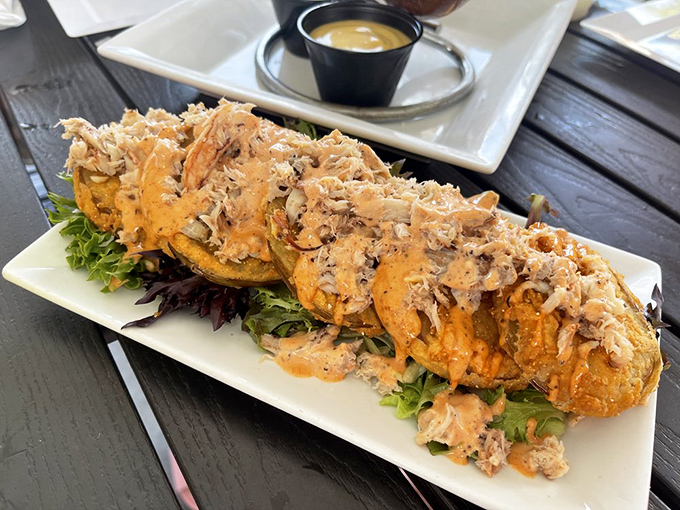Crab-topped fried tomatoes that somehow manage to be both indulgent and elegant&mdash;the culinary equivalent of wearing diamonds to the beach.