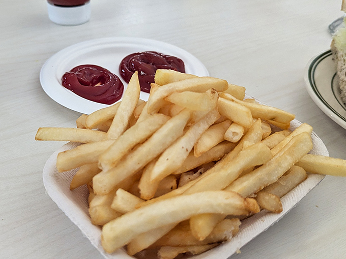 French fries served in a paper cup &ndash; simple, golden, perfect. No truffle oil, no duck fat, no nonsense &ndash; just potatoes fulfilling their highest purpose.
