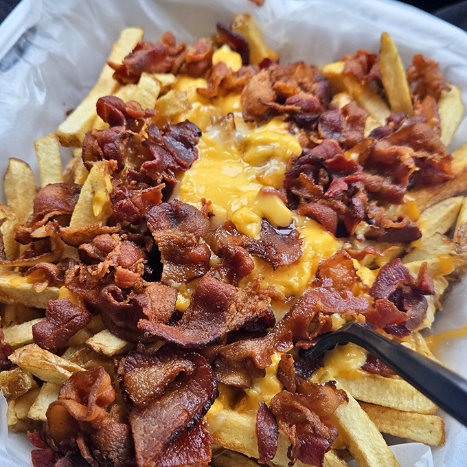 These aren't just cheese fries with bacon &ndash; they're a crispy, gooey monument to the art of indulgence.