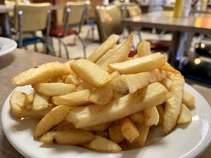 These aren't just french fries; they're golden potato pillars of comfort that make everything else on your plate jealous.