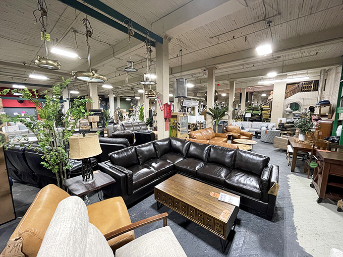 Black leather sectionals await their next binge-watching marathon, promising comfort for countless Netflix seasons and Sunday football games.