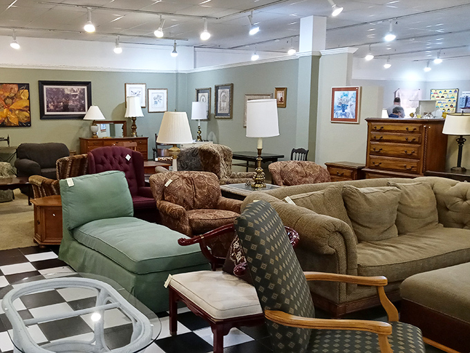 Furniture arranged like a living room time machine. That mint green chaise lounge is practically begging to be the star of your reading nook.