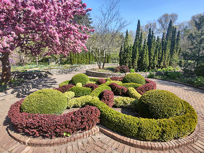 Precision meets whimsy in this formal garden. Those hedges didn't trim themselves into perfect curves&mdash;someone's living their topiary dreams here.