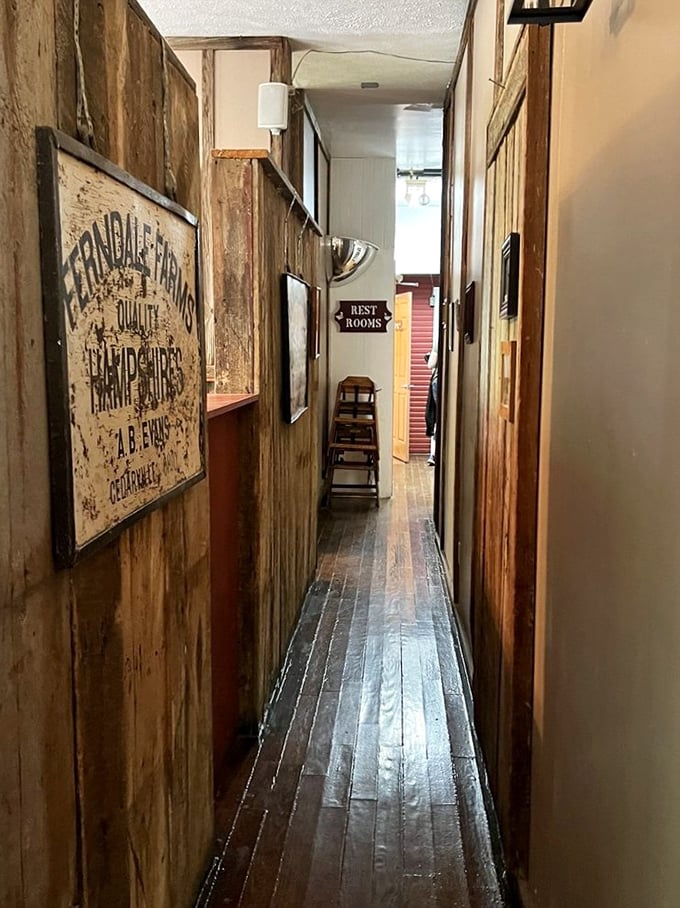 Narrow hallways with weathered wood walls tell stories of countless footsteps over decades&mdash;each creak a different chapter in mill history.