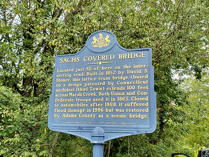 This blue marker tells the bridge's official story, but locals will share tales that never made it onto the plaque. Listen carefully.
