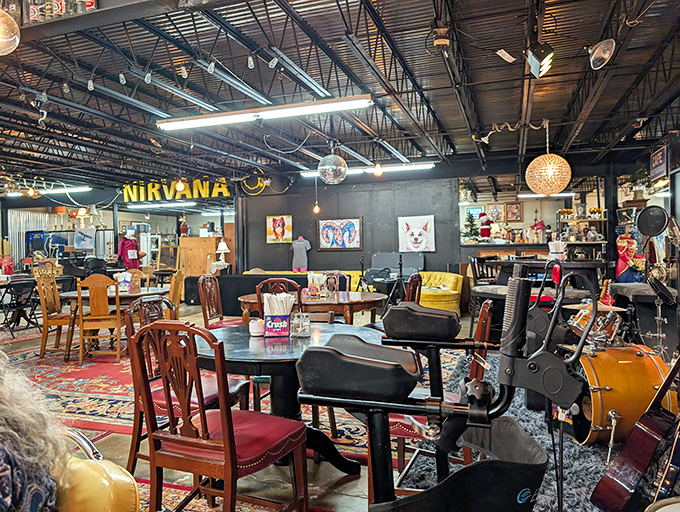 The "Nirvana" sign isn't lying&mdash;this room is heaven for vintage furniture lovers. Kurt Cobain references aside, this space hits all the right nostalgic notes.