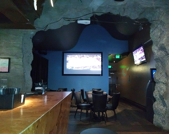 Cave-like alcoves offer intimate seating for those who prefer their underwater adventures with a side of privacy.